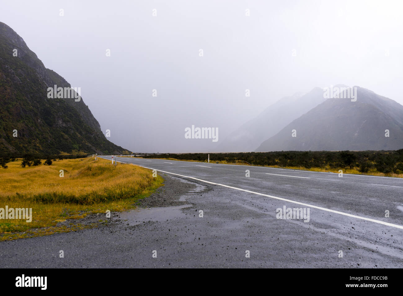 Natural landscape of New Zealand alps and road Stock Photo - Alamy