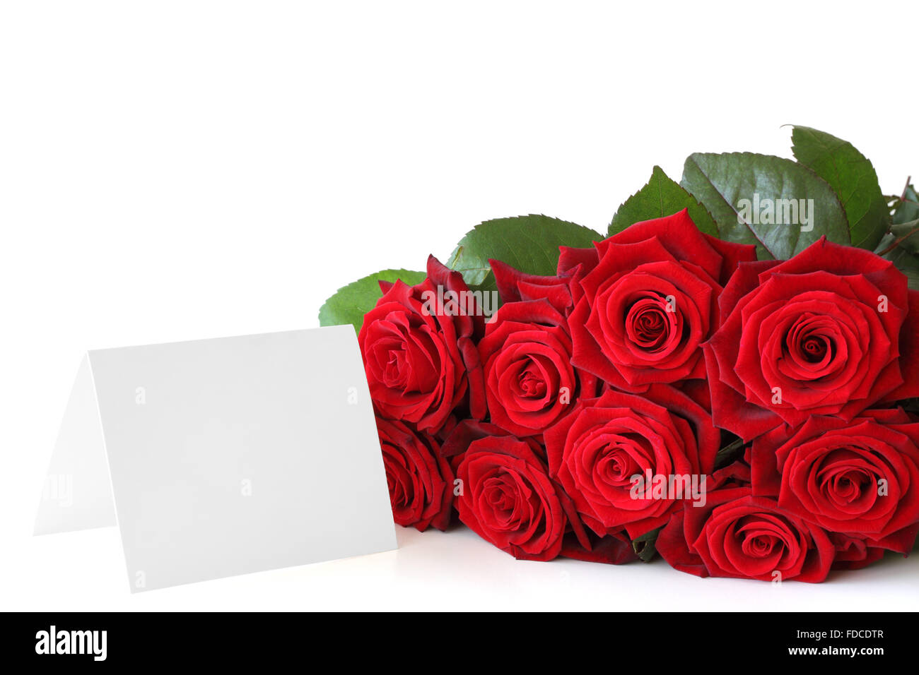 A bunch of roses with a blank card for congratulations Stock Photo - Alamy