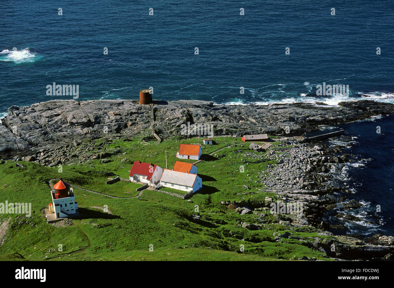 Lighthouse and buildings at Kvalneset, Runde island, Norway Stock Photo ...