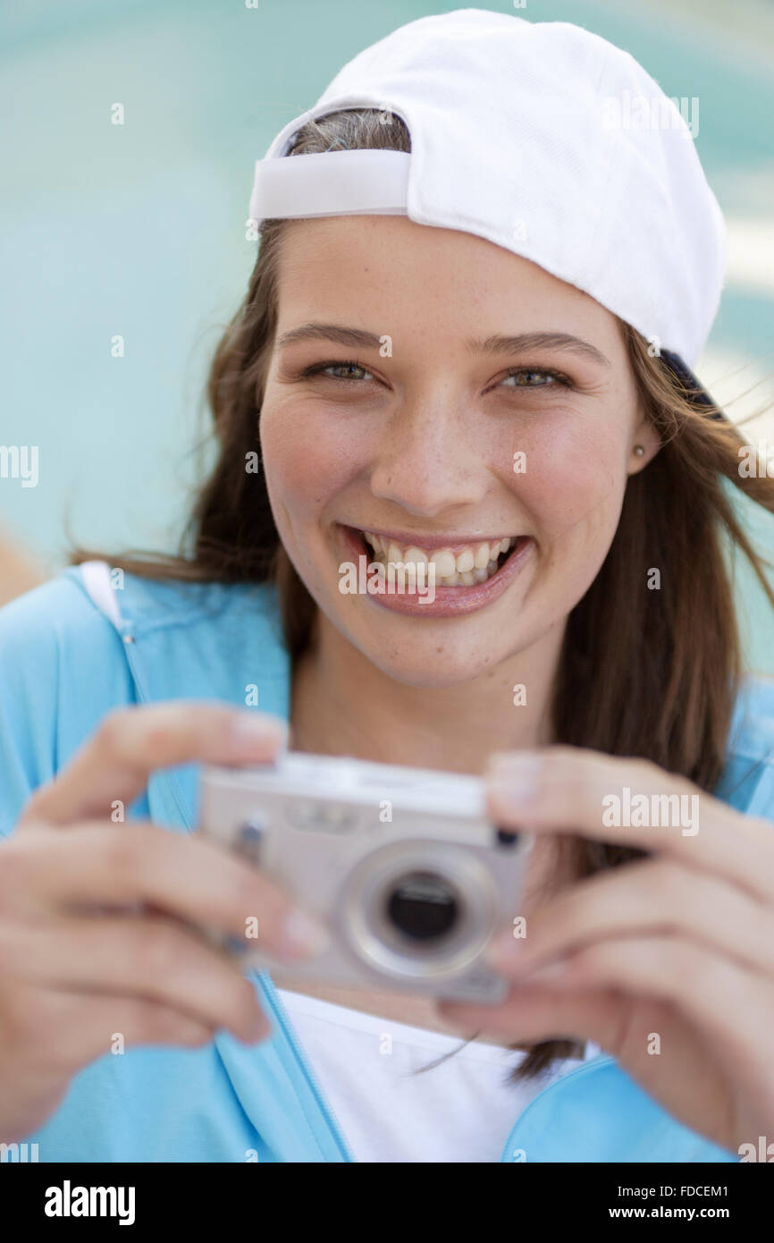 Young woman using digital camera Stock Photo - Alamy