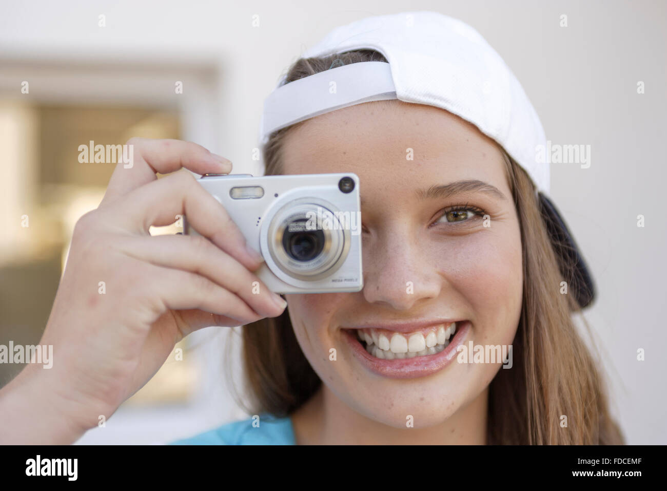 Young woman using digital camera Stock Photo - Alamy