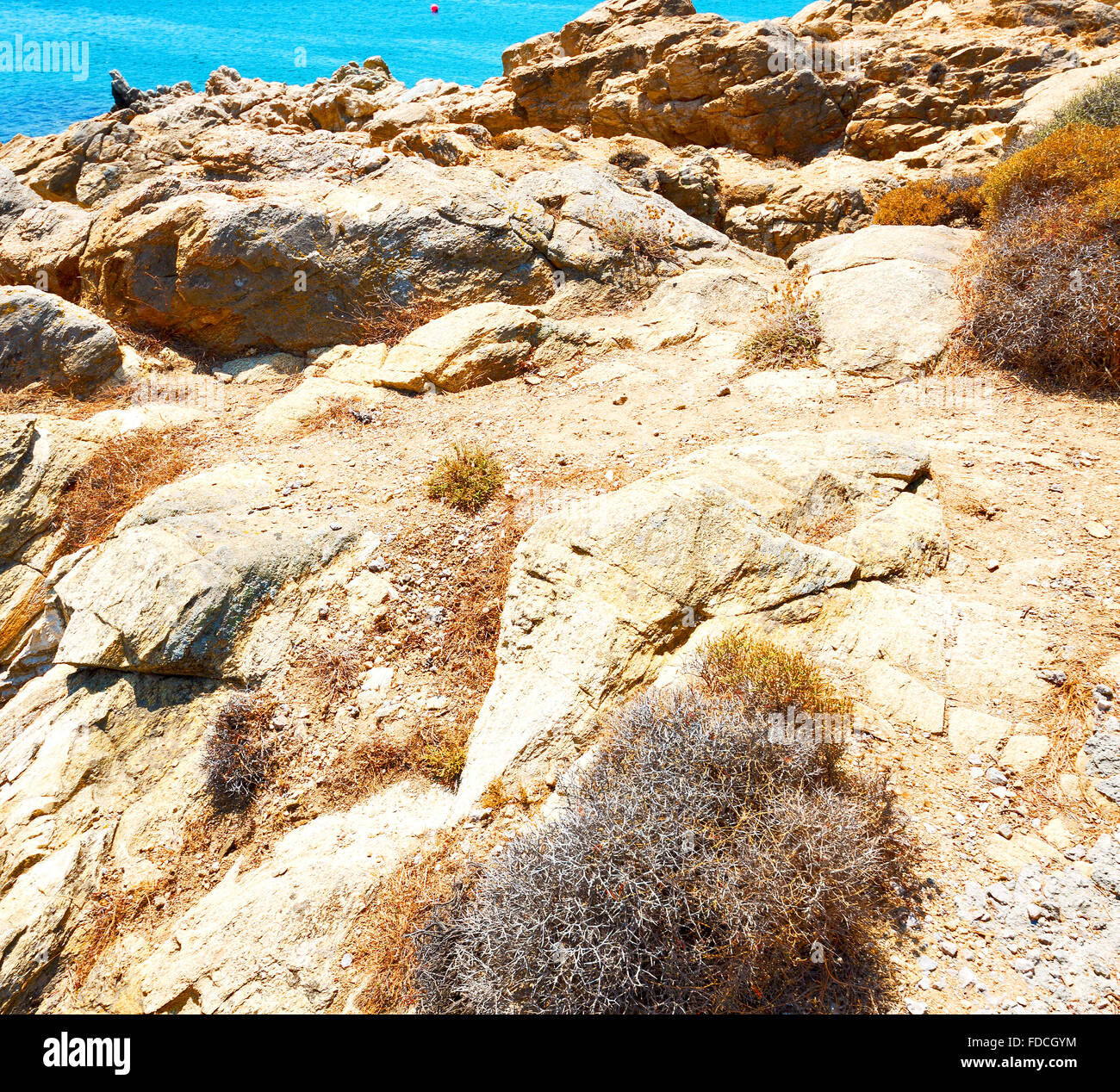 in greece the mykonos island rock sea and beach sky Stock Photo - Alamy