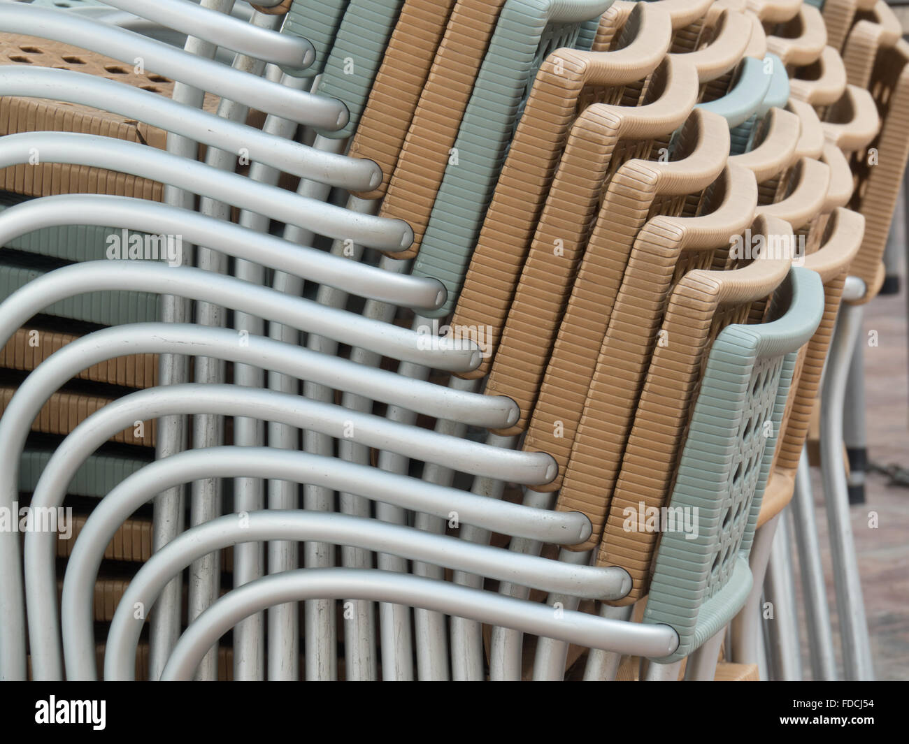Pattern of side of Stacked Chairs Stock Photo - Alamy