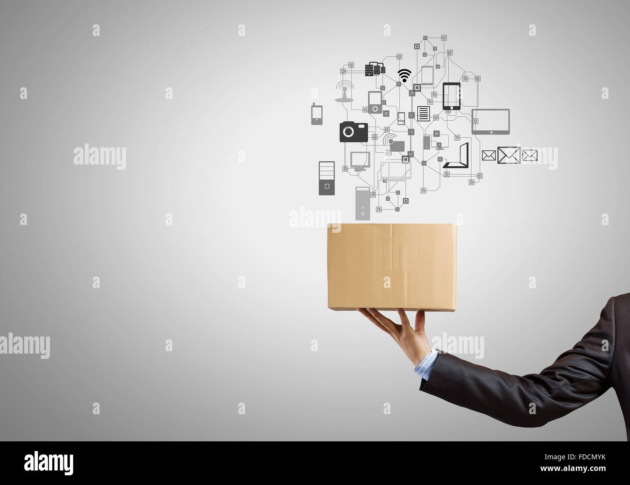 Close up of hand holding carton box Stock Photo - Alamy