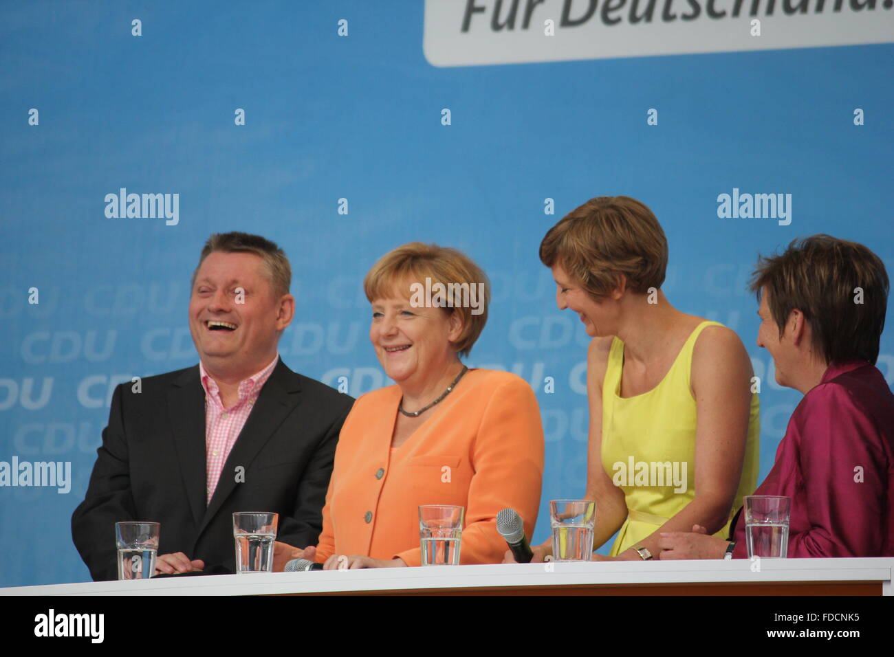 Angela Merkel and health minister Gröhe on the market place in Bonn ...