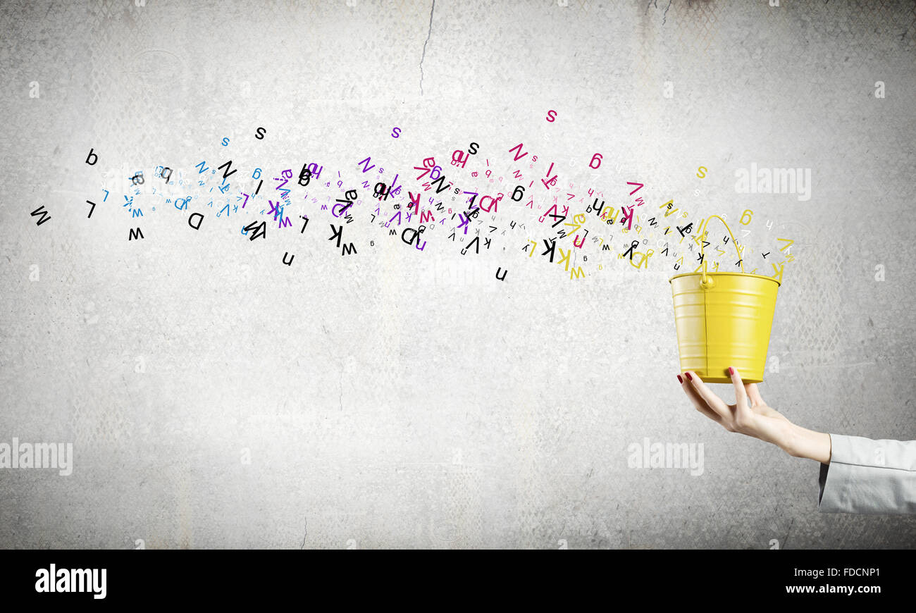 Close up of woman hand holding bucket Stock Photo - Alamy
