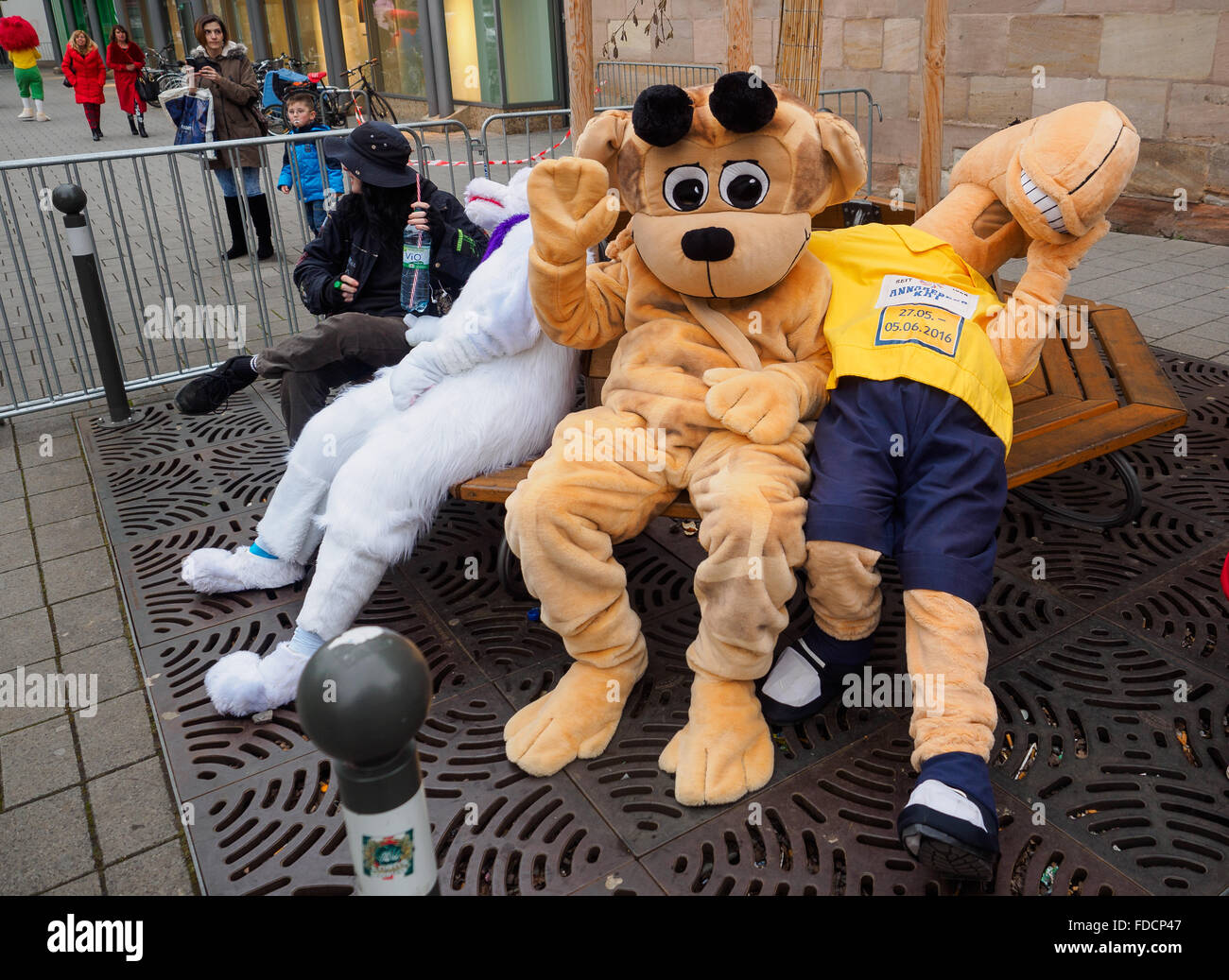 Nuremberg, Germany. 30th Jan, 2016. Tired mascots take a break in ...
