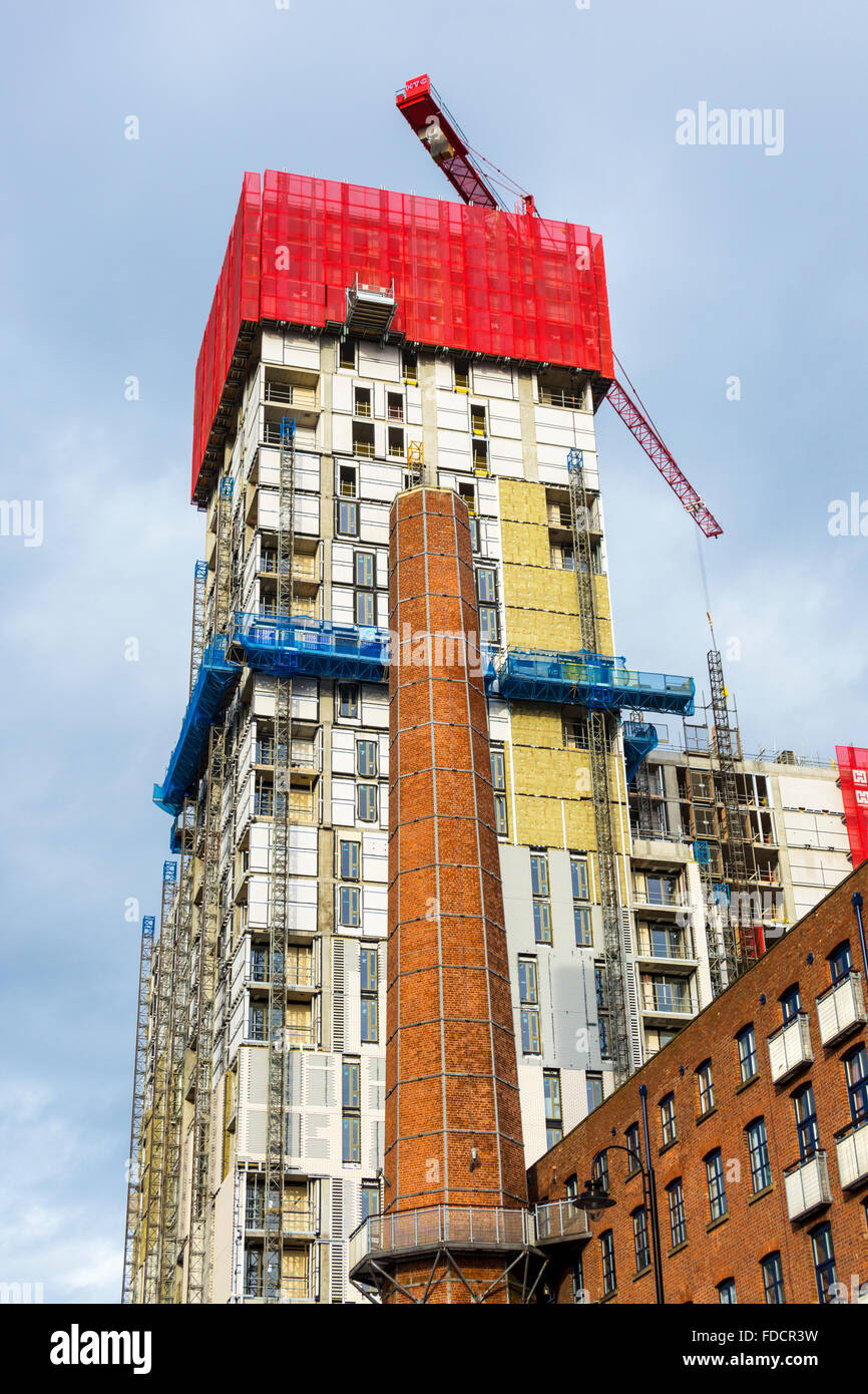 Cambridge Street apartment block under construction and an old factory ...