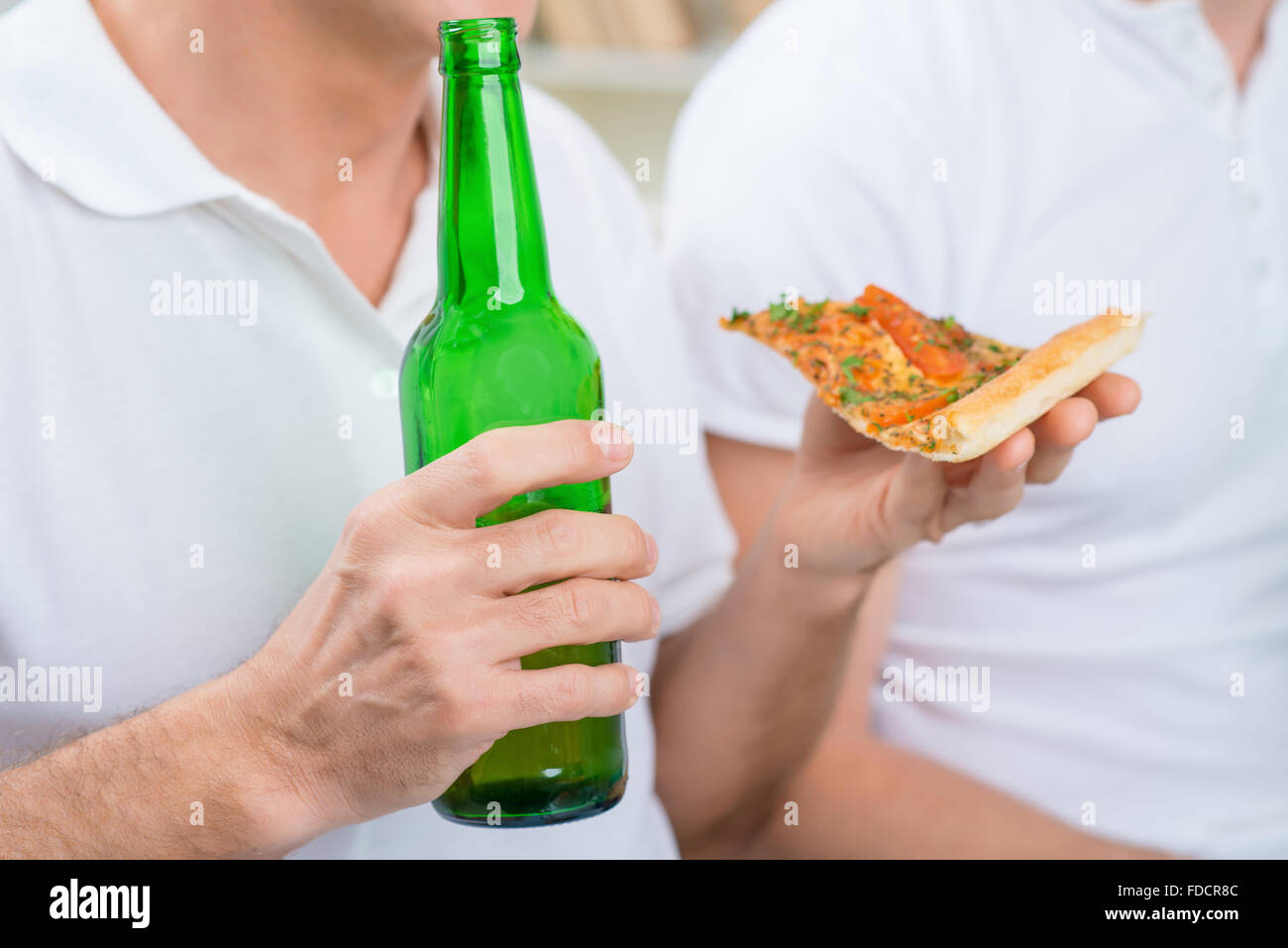 Father and his adult son drinking beer Stock Photo - Alamy