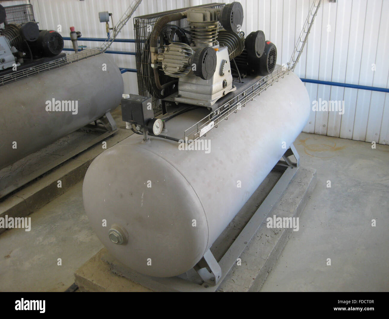 Air compressor. equipment for creation of pressure air Stock Photo - Alamy