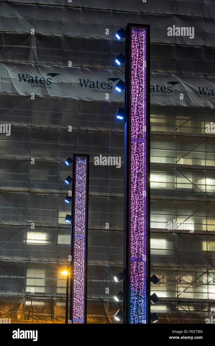 Illuminated lamp towers in Sadler's Yard, off Dantzic Street, NOMA area ...
