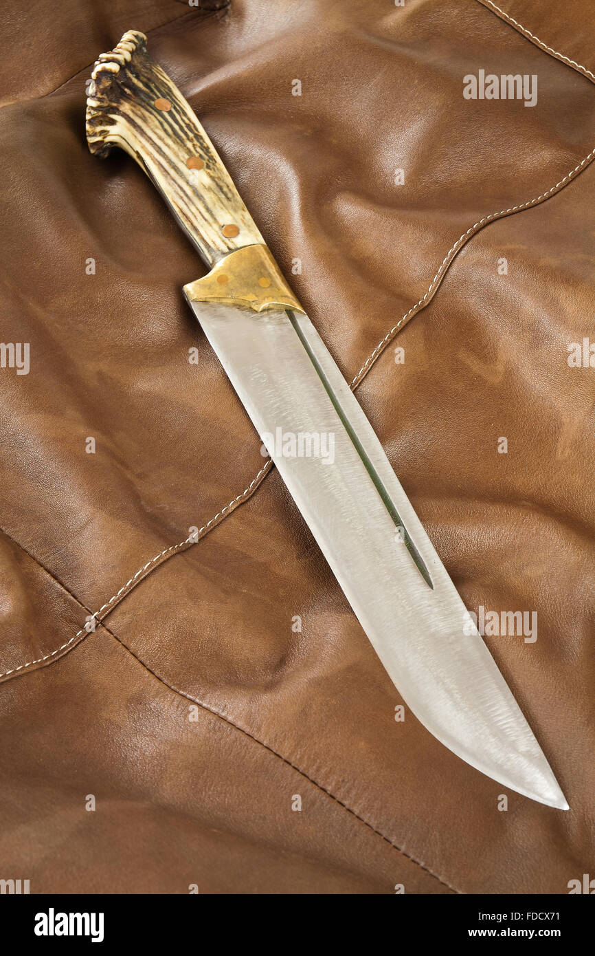 Hunting knife with a handle made of deer horn Stock Photo - Alamy