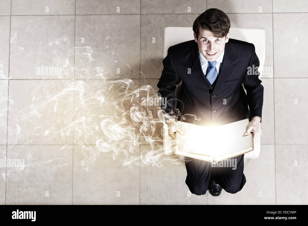 Top view of businessman sitting on chair Stock Photo - Alamy