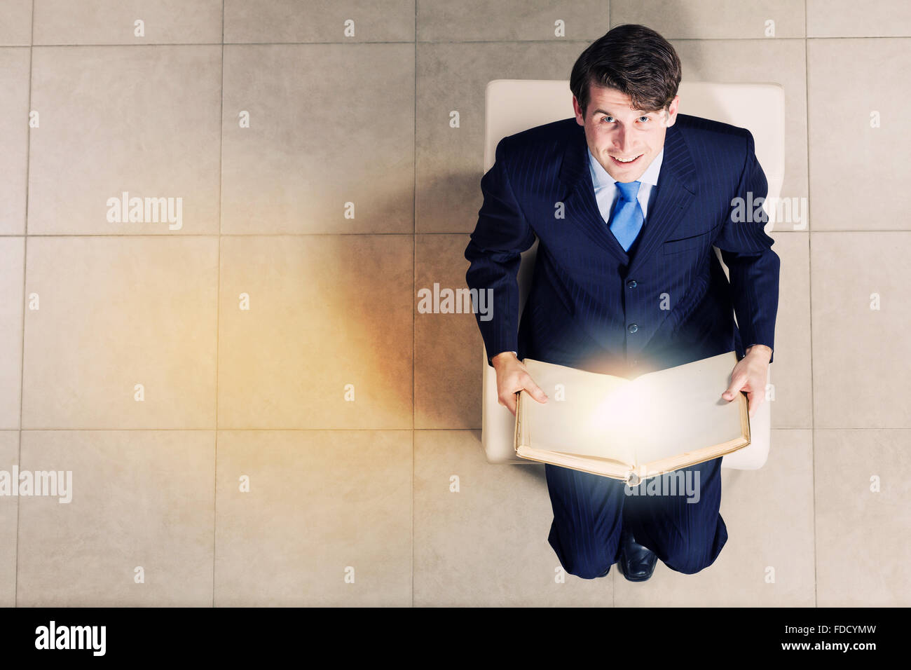 Top view of businessman sitting on chair Stock Photo - Alamy
