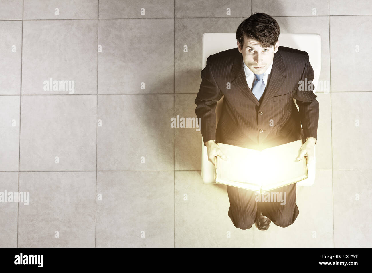 Top view of businessman sitting on chair Stock Photo - Alamy