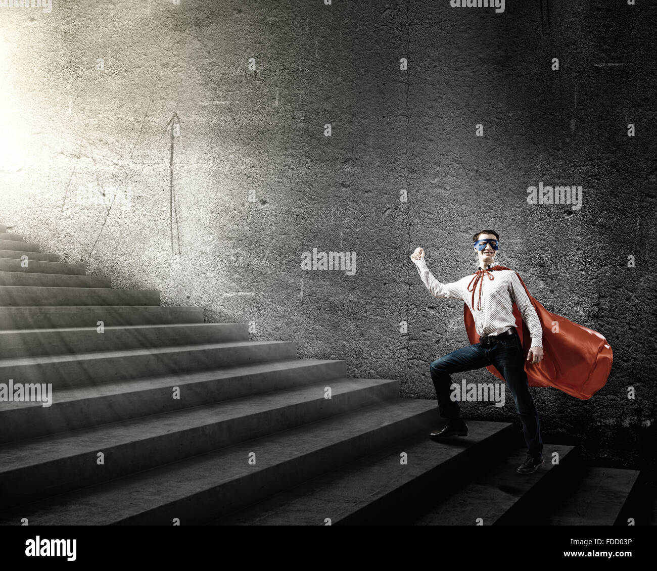 Young superman walking up stair hi-res stock photography and images - Alamy