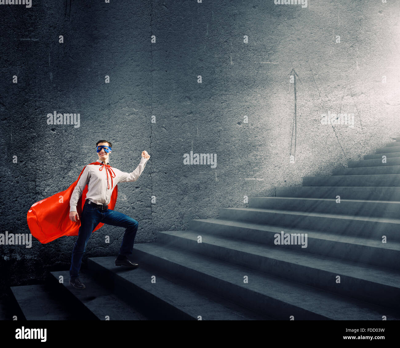 Young superman walking up stair hi-res stock photography and images - Alamy