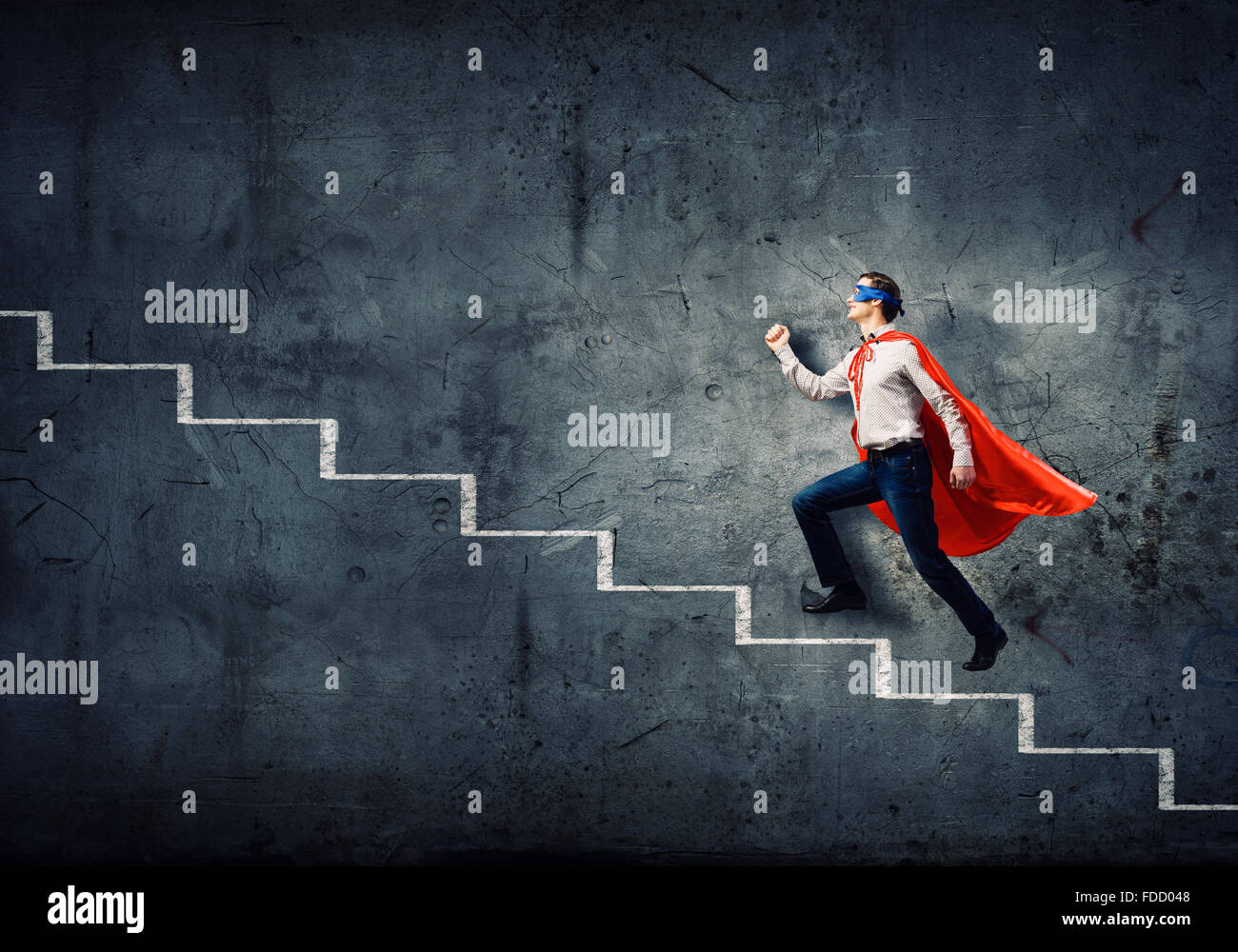 Young superman walking up stair hi-res stock photography and images - Alamy