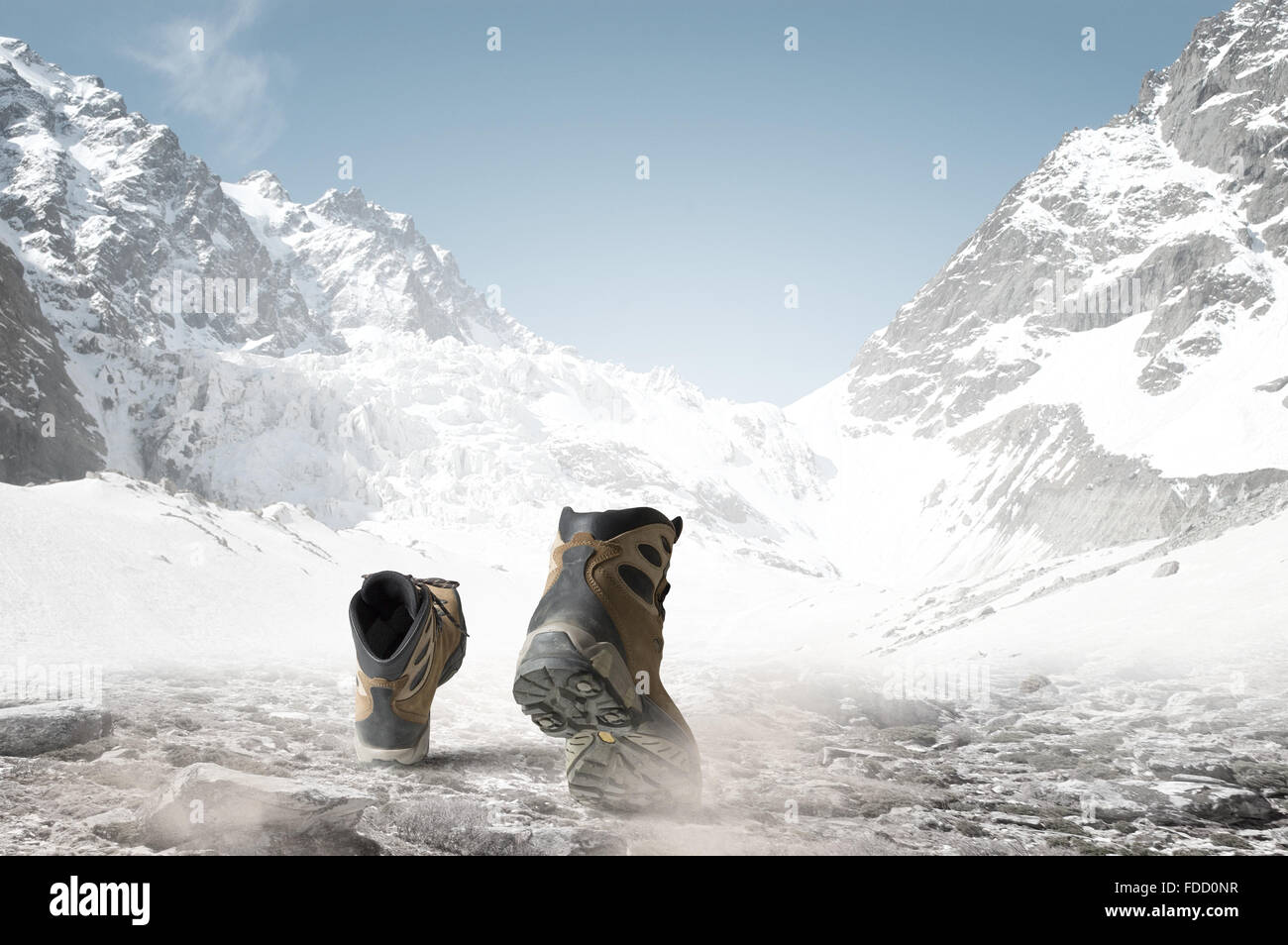 Pair of hikers boots walking on path Stock Photo - Alamy