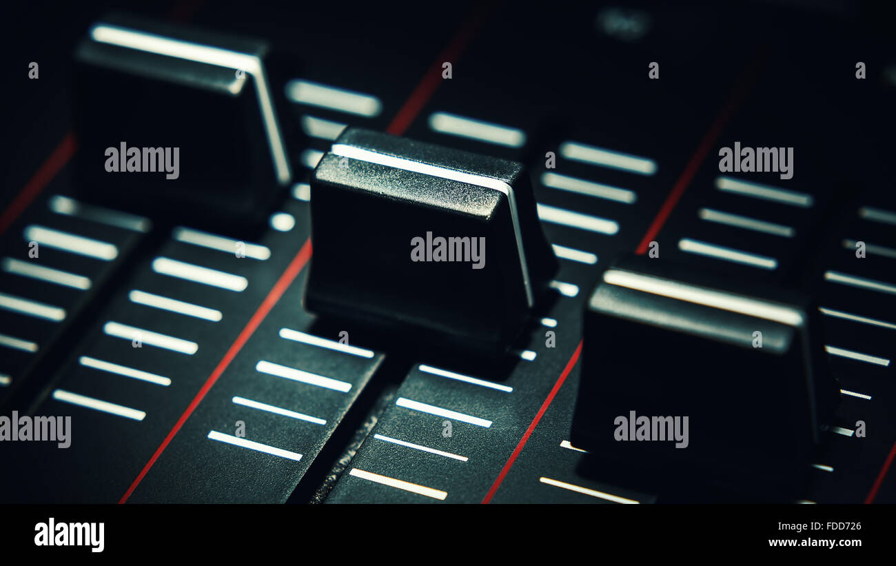 Details of a sliders of a modern midi controller, audio studio music ...