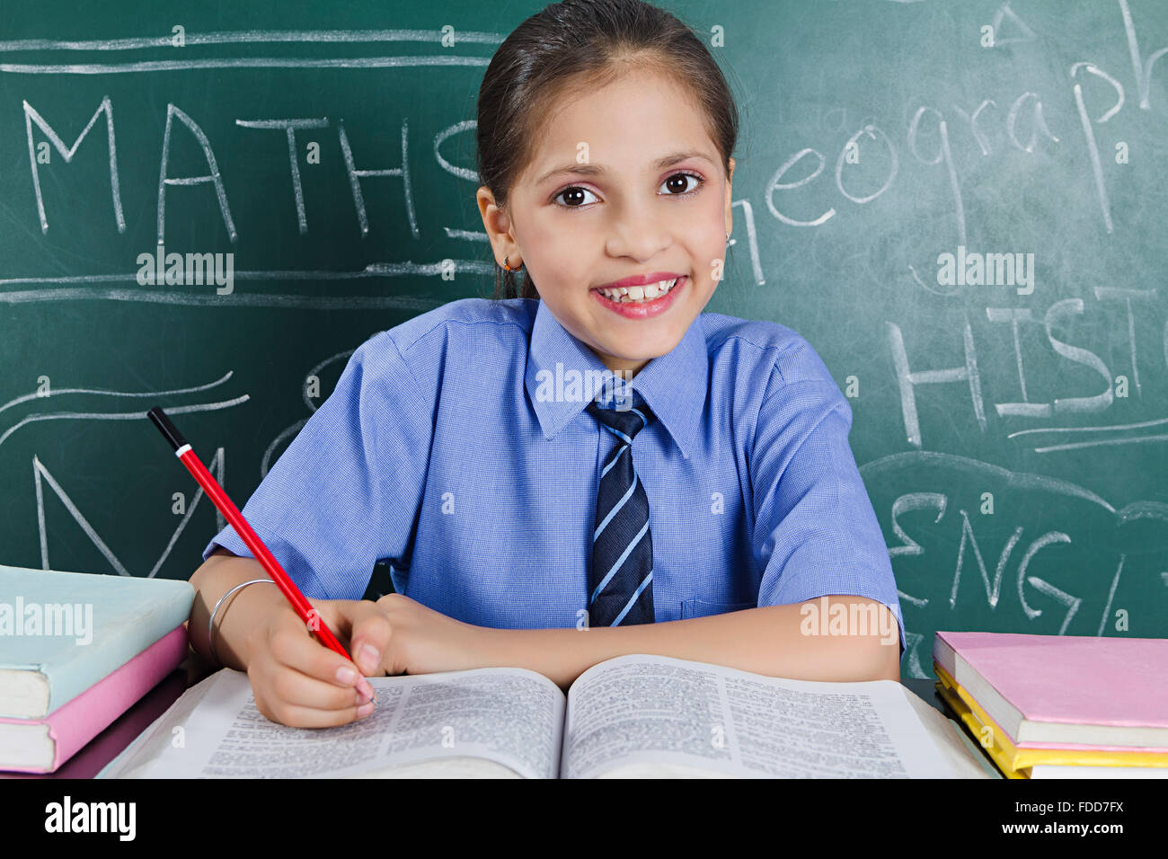 1 Child Girl School Student Classroom Studying Book Writing Stock Photo ...