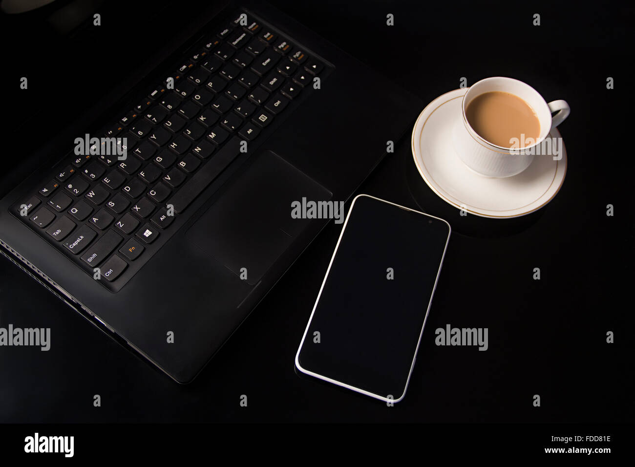 Mobile phone laptop office hi-res stock photography and images - Alamy