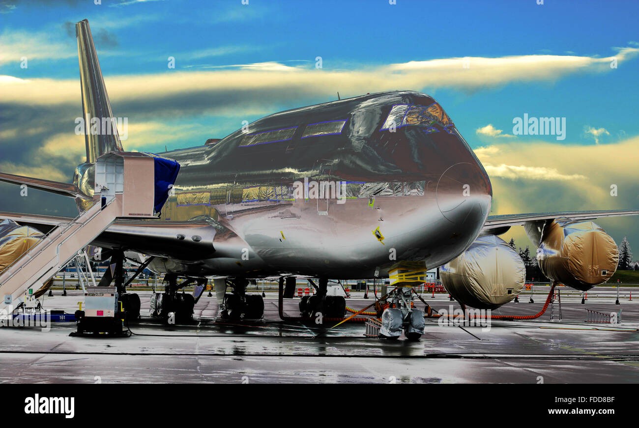 Jet under construction on the tarmac with covered engines Stock Photo ...