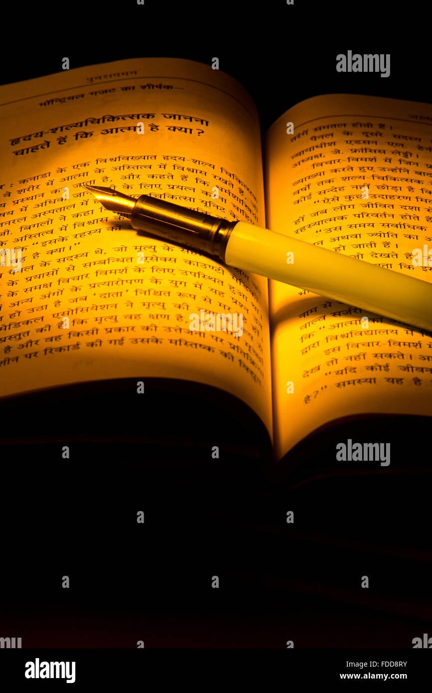 Education Book and pen writing Nobody Stock Photo - Alamy