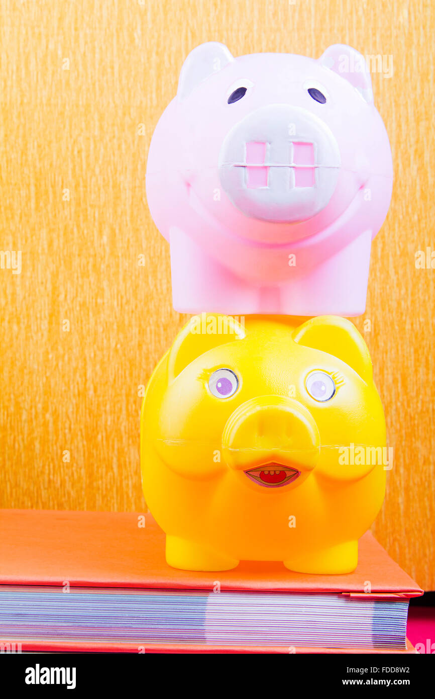 Book and Piggy Bank Saving Money Nobody Stock Photo - Alamy