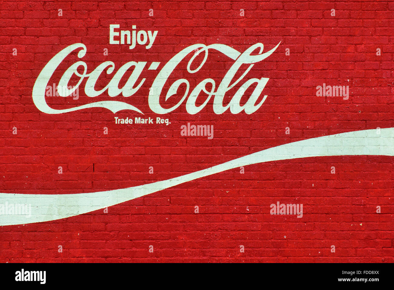 Brick wall with Coca-Cola logo Stock Photo - Alamy