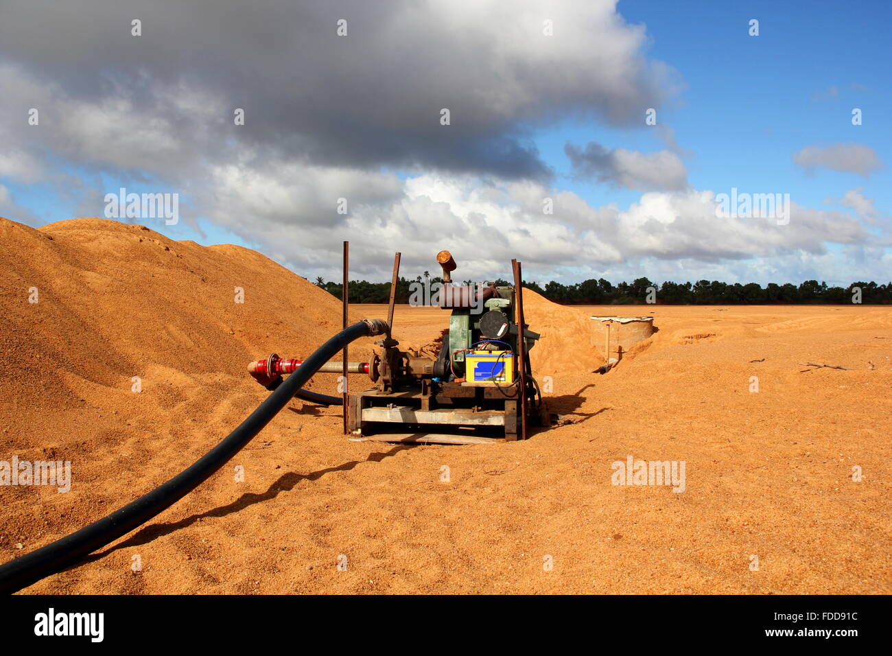 Water pump in a dry river bed Stock Photo - Alamy