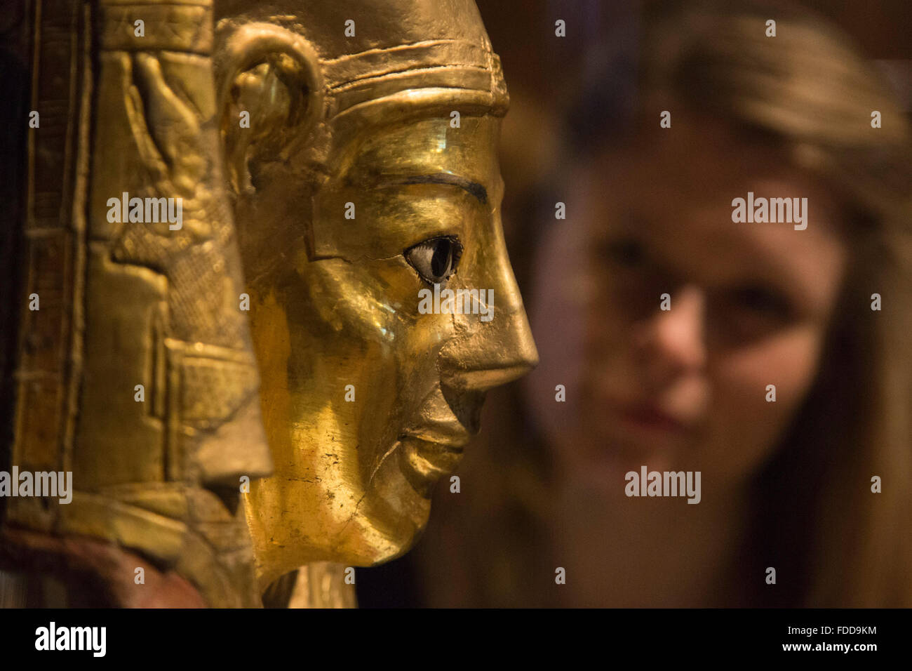 London, UK. 29 January 2016. Gilded and painted cartonnage mummy mask ...