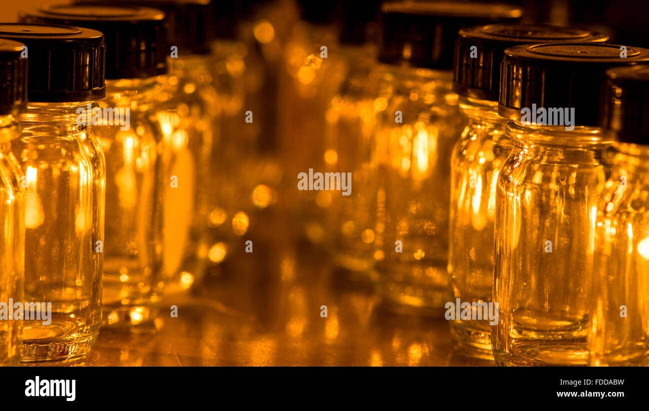 row of empty and small glass bottles Stock Photo - Alamy