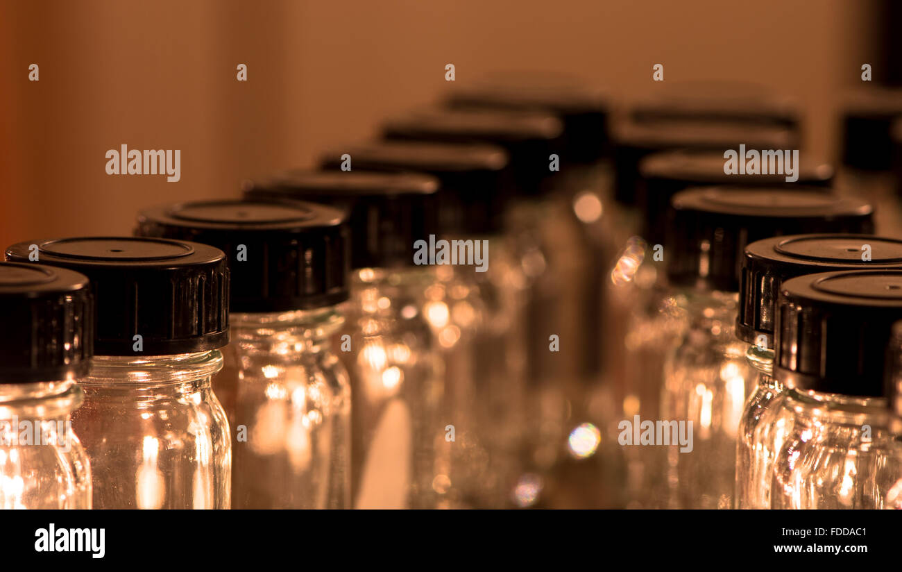 row of empty and small glass bottles Stock Photo - Alamy
