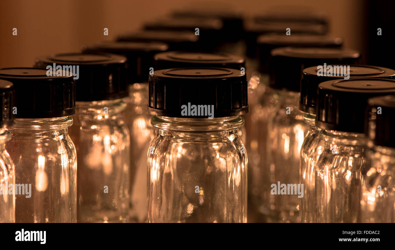 row of empty and small glass bottles Stock Photo - Alamy