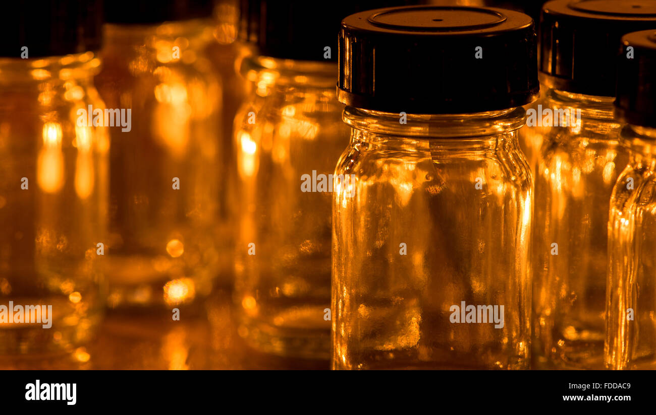 row of empty and small glass bottles Stock Photo - Alamy
