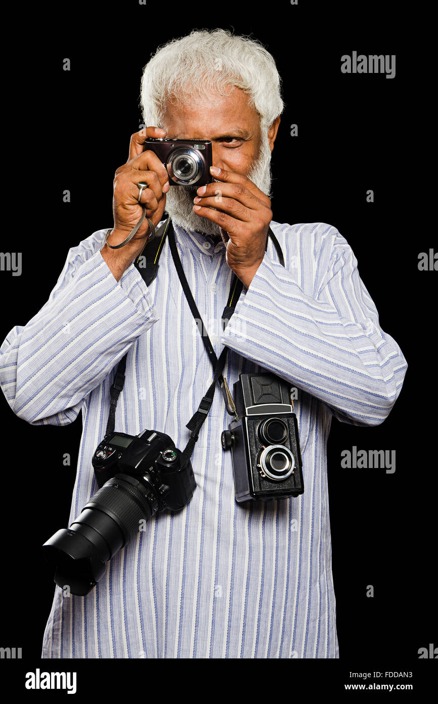 Man clicking camera indian hi-res stock photography and images - Alamy
