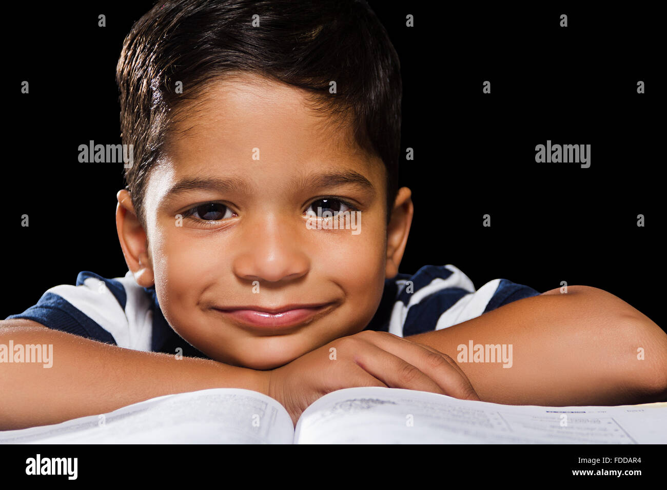 Indian Boy Reading A Book