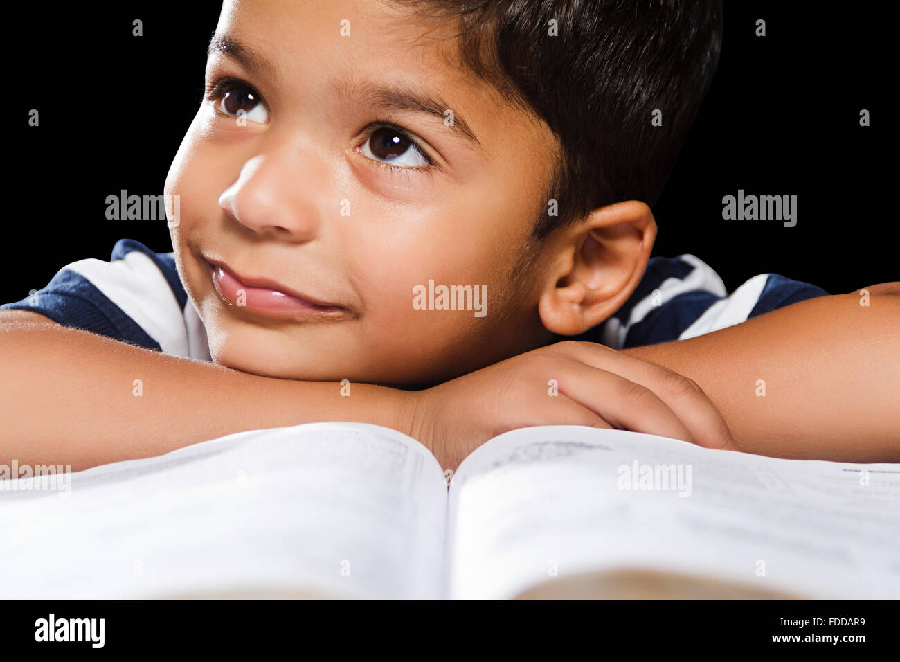Indian child reading hi-res stock photography and images - Alamy