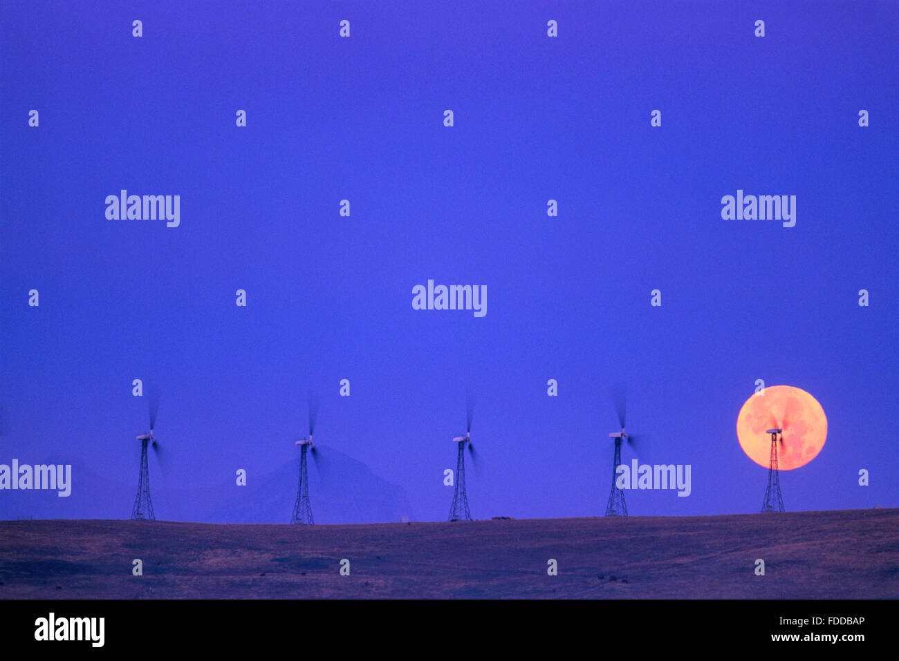 Wind turbine behind house hi-res stock photography and images - Alamy