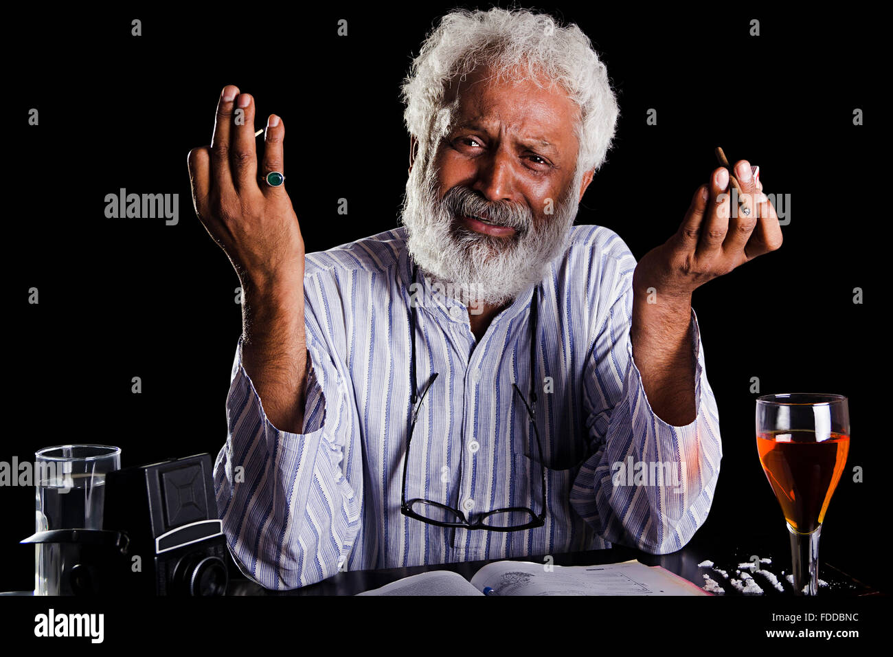 1 indian Senior Adult Man Journalist Book writing crying smoking ...