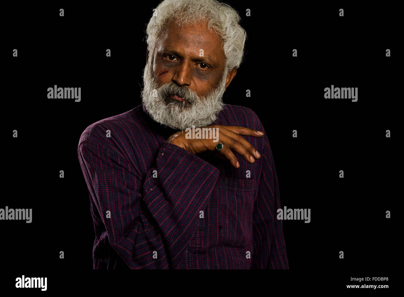 1 indian Senior Adult Man Victim Injury face Stock Photo - Alamy