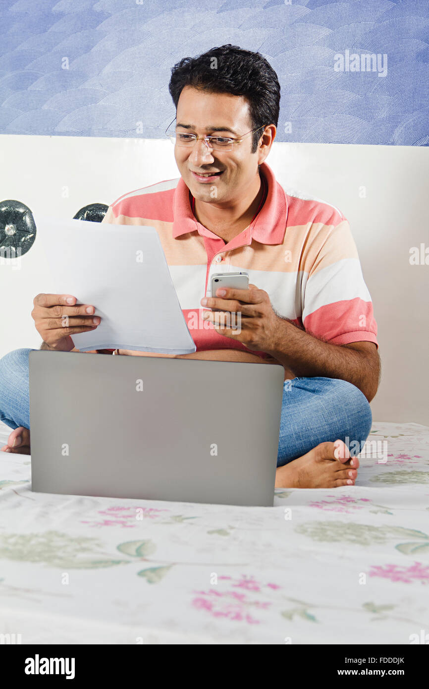 Man 40 years checking hi-res stock photography and images - Alamy