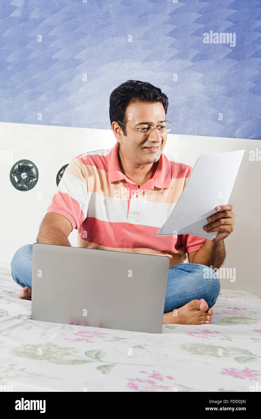 Man 40 years checking hi-res stock photography and images - Alamy