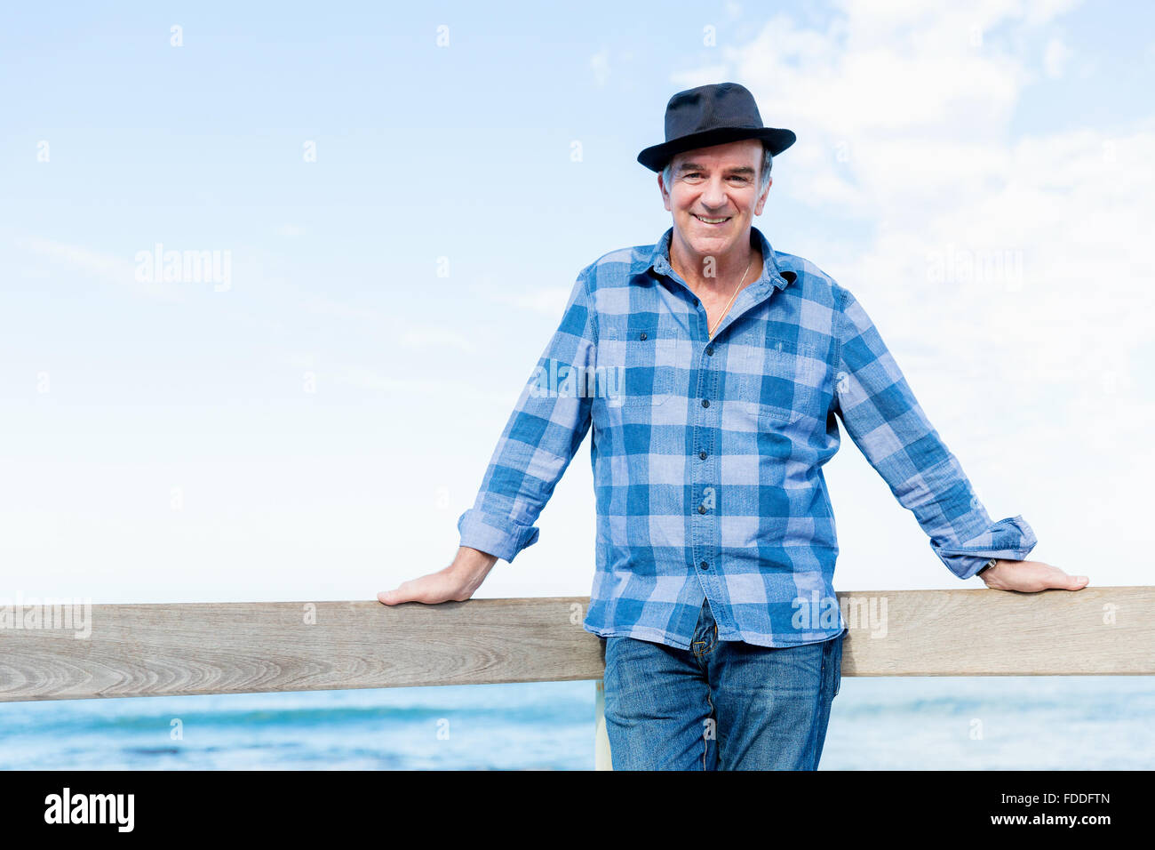 Portrait of an od man next to ocean Stock Photo - Alamy