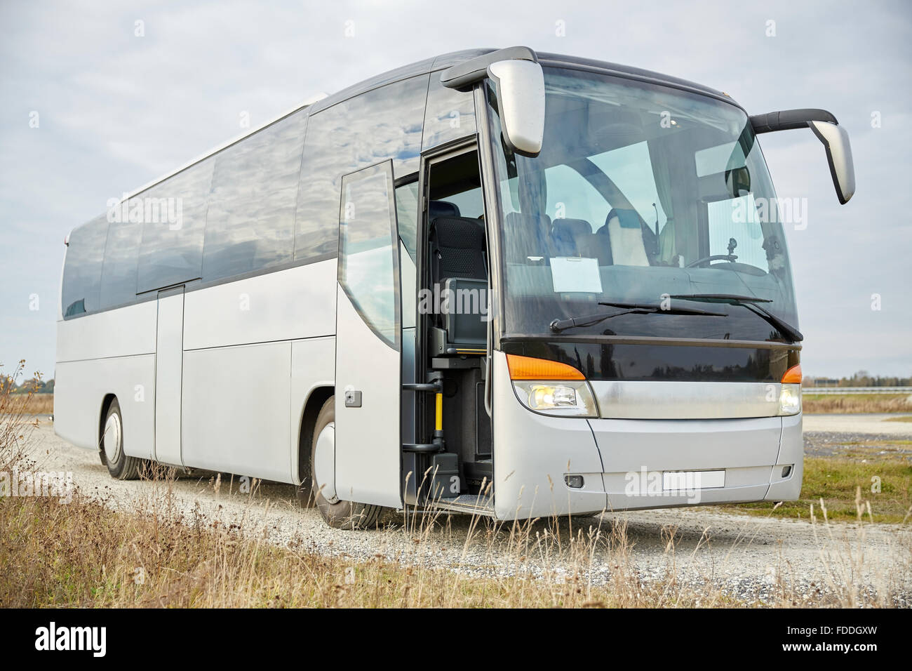 tour bus staying outdoors Stock Photo - Alamy