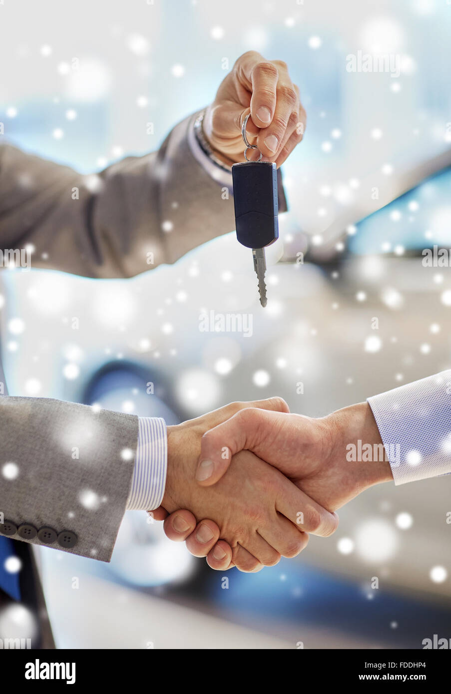 Hand shaking key in hi-res stock photography and images - Alamy