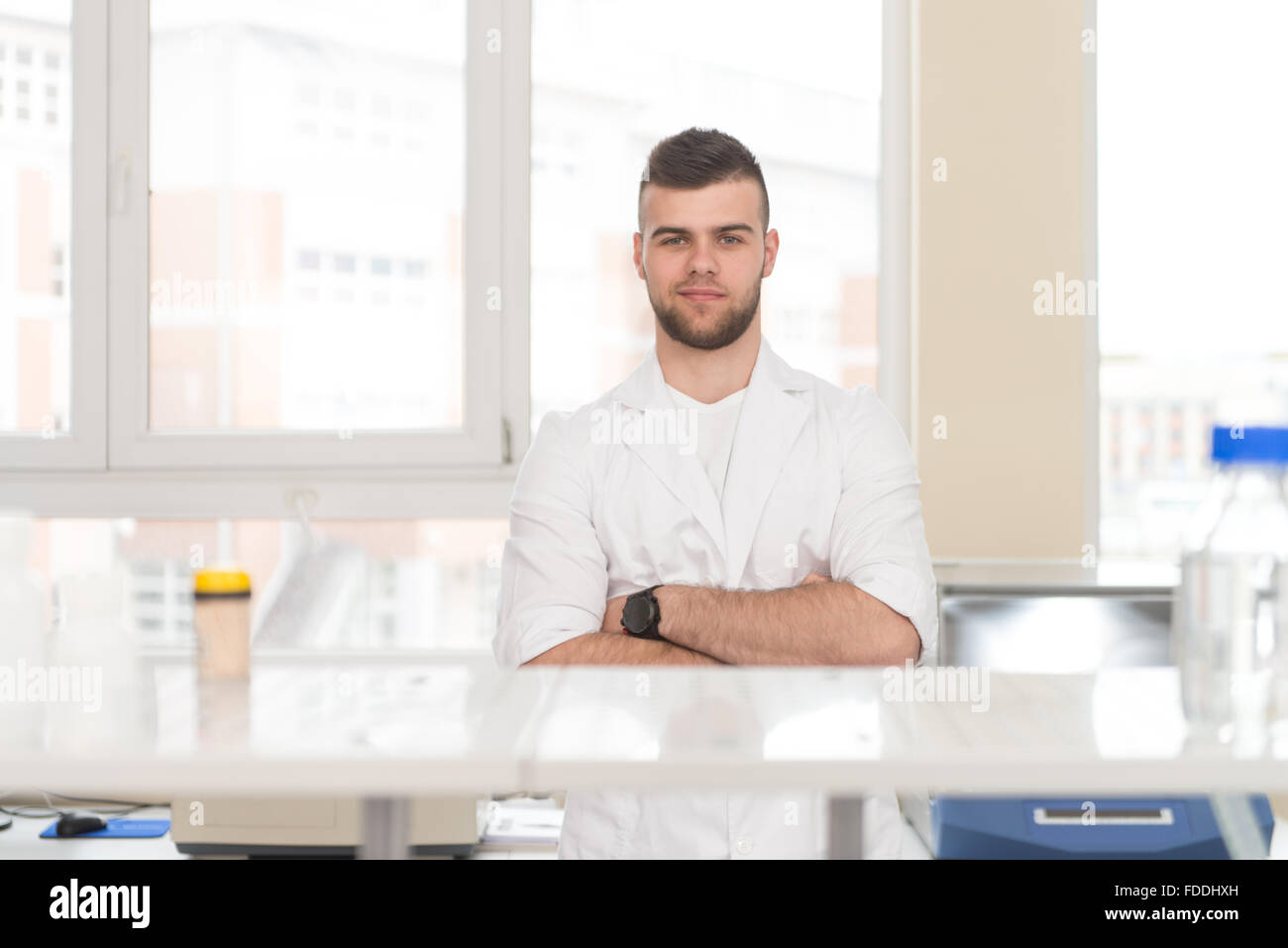 Portrait Of A Caucasian Student In A Chemistry Lab Smiling And Looking ...