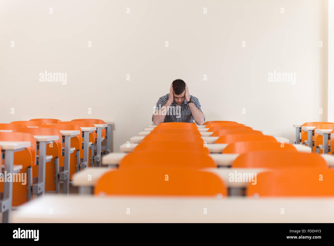 Black student alone in classroom hi-res stock photography and images ...