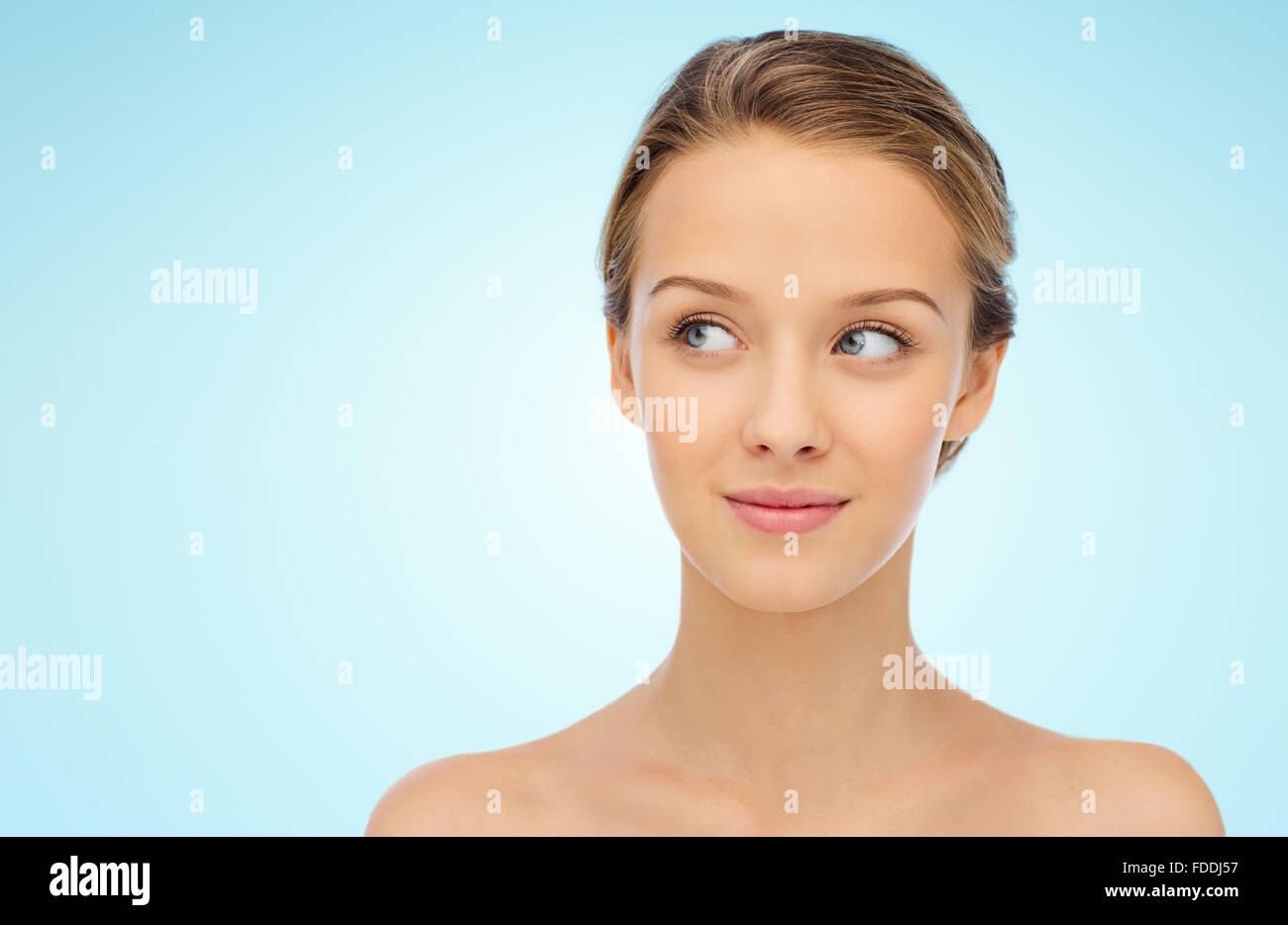 smiling young woman face and shoulders Stock Photo - Alamy